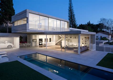 Modernist Inspired House In Tel Aviv Features A Cantilevered Upper Storey