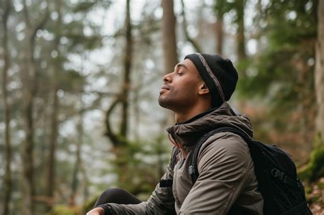 Premium Photo Man Relaxing In A Forest