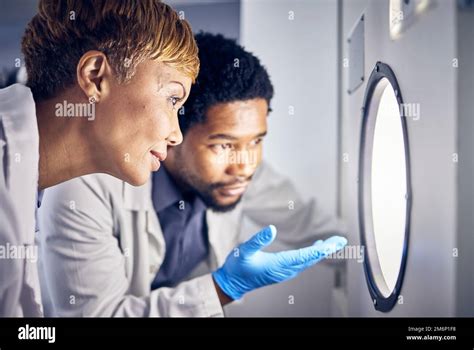Science Man And Woman In Laboratory Research And Test Sample For Cure Vaccine Or Conversation