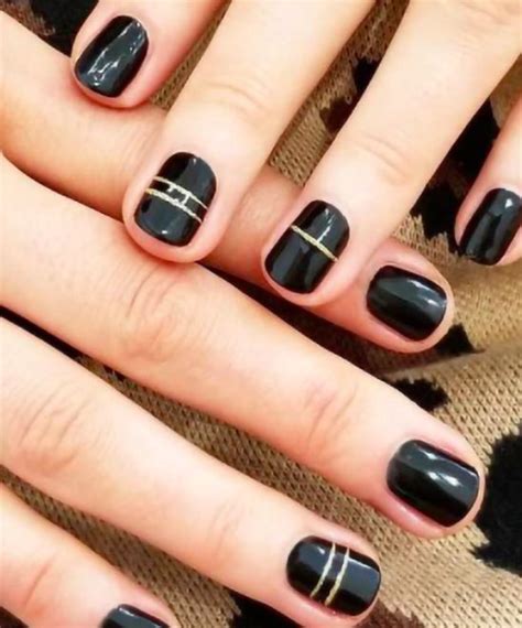 Understated Black And Gold Nail Designs Tailoringinhindi