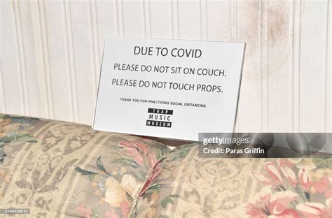A sign reads, "Please do not sit on the couch" at The Trap Music... News Photo - Getty Images