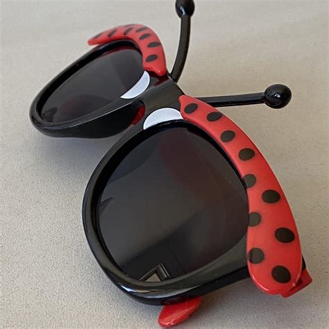 Ladybug Sunglasses With Black Frames And Red And Depop