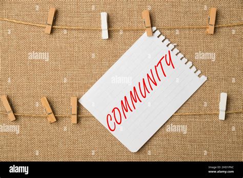 Hand Writing Sign Community Business Showcase Specific Population With A Common Characteristics