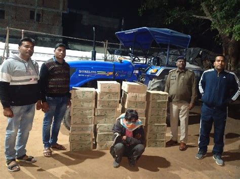 Smuggling Liquor By Filling It In Tractor Arrested The Accused By