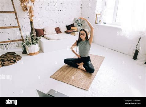 Beautiful Brunette Fitness Woman Make Stretching Exercises In Front