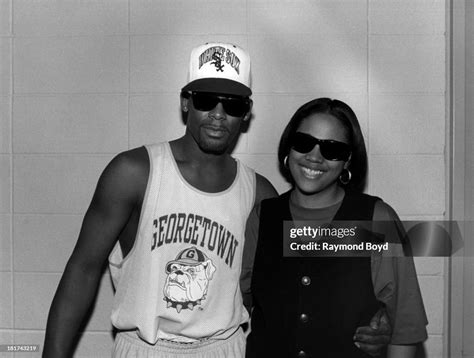 Singer R Kelly And Rapper And Radio Personality Monie Love Poses