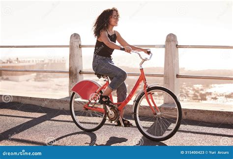 Woman Cycling And Bike At Beach For Travel With Freedom Sea And