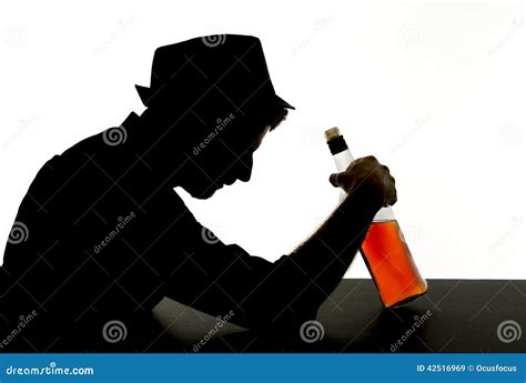 Alcoholic Drunk Man With Whiskey Bottle In Alcohol Addiction Silhouette