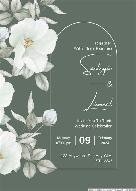 An Elegant Wedding Card With White Flowers And Greenery On The Front