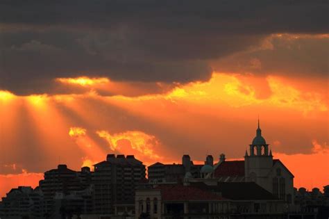 Premium Photo Buildings At Sunset