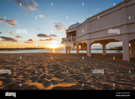 Romantic Sunset At Cadiz Beach With Famous Pier Stock Photo Alamy