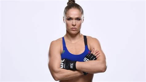 See Ronda Rousey On Lockdown In An Orange Prison Uniform For Tvs