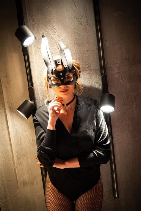 Woman In Black Underwear In Bdsm Bunny Leather Mask And Accessories