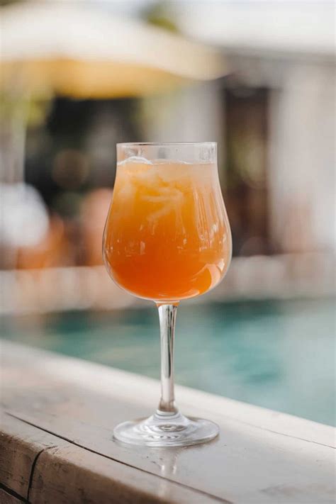 Tropical Sunset Cocktail Recipe Howdykitchen