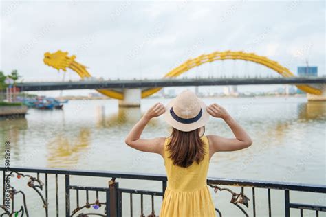 Woman Traveler With Yellow Dress Visiting In Da Nang Tourist