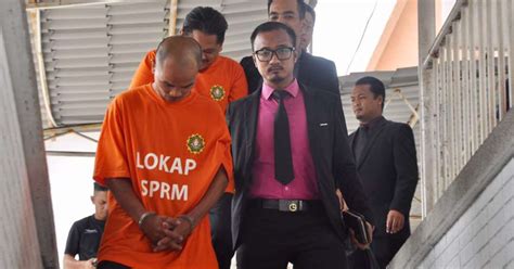Two Cops Remanded Over Bribe New Straits Times
