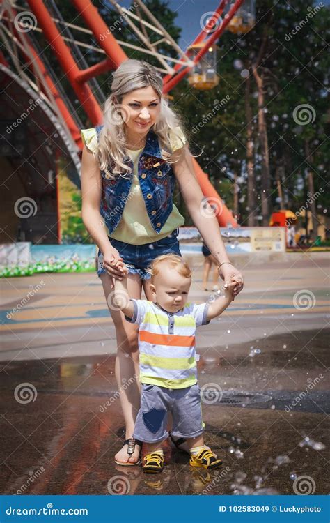Young Mother Walks With Her Son Stock Image Image Of Enjoyment