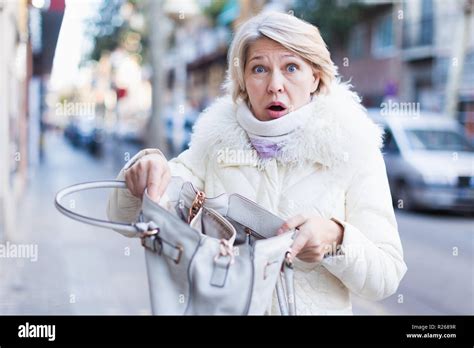 Adult Female Is Having Problem Because Her Wallet Was Stolen Outdoor Stock Photo Alamy