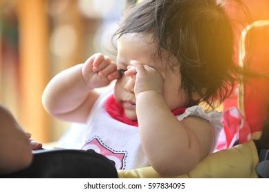 Sweet Beautiful Baby Girl Rubbing Her Stock Photo Shutterstock