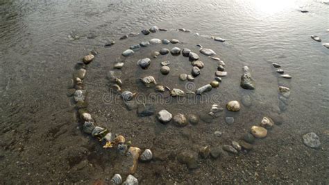 Spiral From Pebble To Stones On The Shore Beach Gravedona In Lake