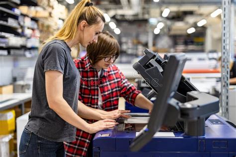 Professional Female Employees Working In A Printing House Stock Image