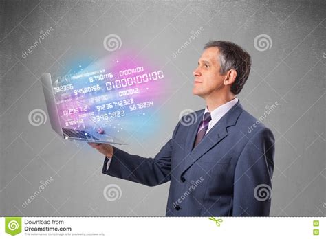 businessman holding notebook with exploding data and numbers stock