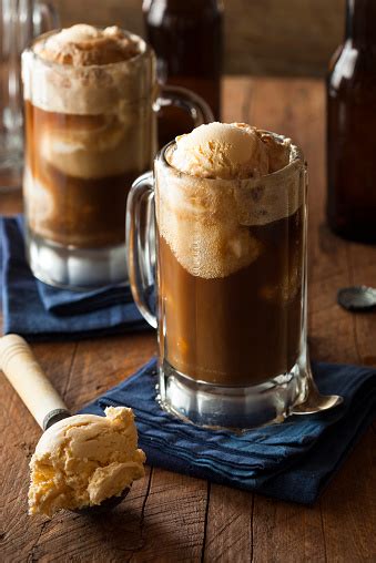 Two Mugs Of Refreshing Root Beer Float Served With Ice Cream Stock