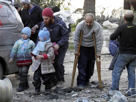 Six Hundred Syrians Flee Besieged Old Homs In Aid Convoy Reuters