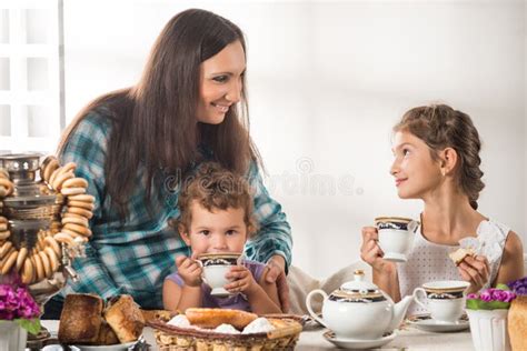 Cute Caring Mother Pours Tea To Little Cute Son Stock Image Image Of