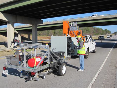 Automated System Detects And Fills Cracks In Asphalt Roads