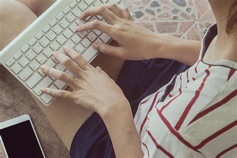 Premium Photo High Angle View Of Woman Typing