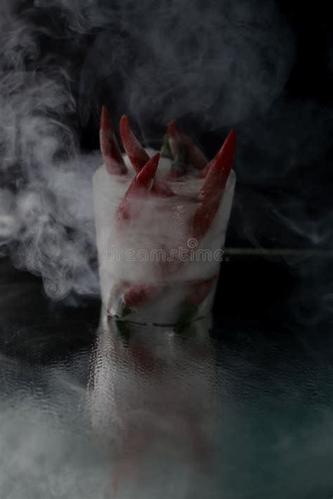 Two Red Peppers Frozen In Ice In Sexual Positions Stock Image Image