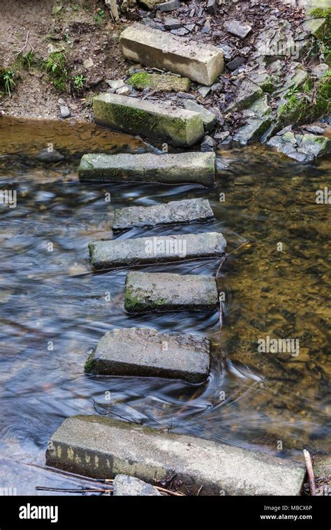 Stone Bridge Across Clean Water Flow Stock Photo Alamy