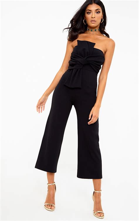 Combinaison jupe culotte bandeau à nœud noire Combinaisons PrettyLittleThing FR