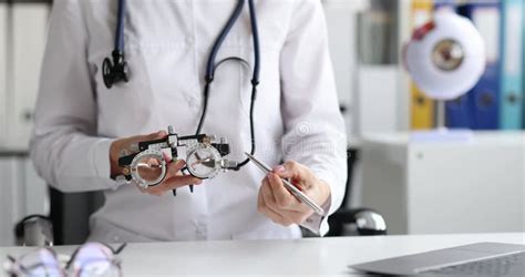 Glasses For Checking Optics And Anatomy Of Eye In Hands Of