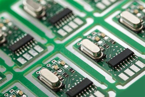 Closeup Of Green Electronic Circuit Board With Processor Stock Photo