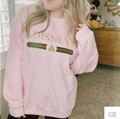 Pin by ℬℛℰᎯℕℕℰ ℛℰℕℰℰ on Disney Girl Graphic sweatshirt Sweatshirts Tops