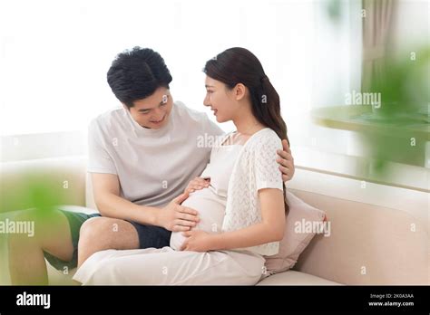 Happy Chinese Pregnant Woman And Husband Stock Photo Alamy