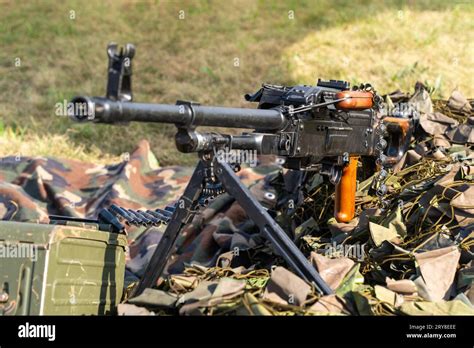 Soviet Made Pk Machine Gun And Camouflage Netting Kalashnikovs
