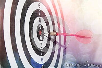 Darts Selective Focus Lens Flare And Blur Concept Attainment Win And Success Winner Skill