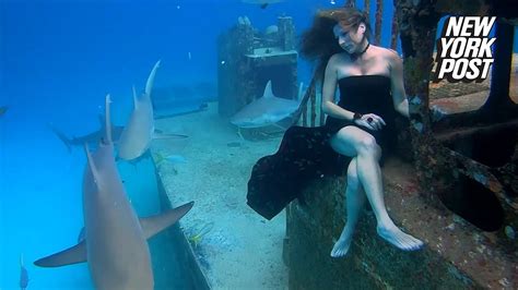 Swimming With Sharks Underwater Model Makes It Look Easy Youtube