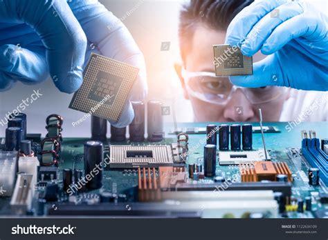 Asian Technician Putting Cpu On Socket Stock Photo 1122634109 Shutterstock