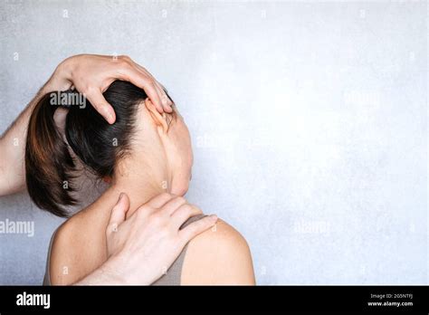 A Chiropractor Performing A Manipulation On Womans Neck And