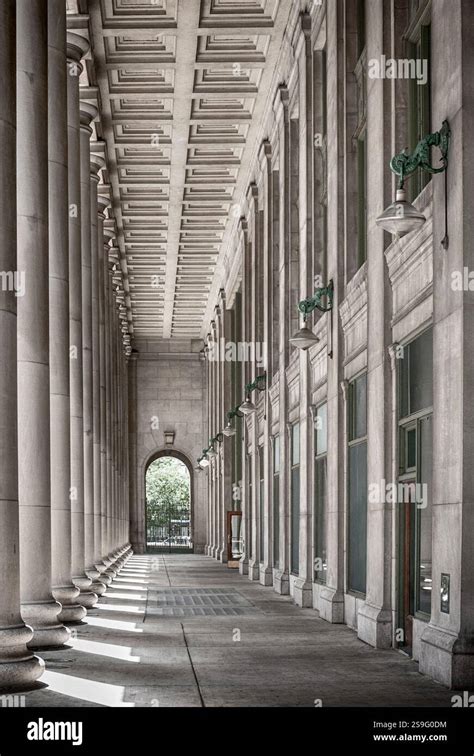 Elegant Architectural Structure Featuring Classical Columns In A Linear