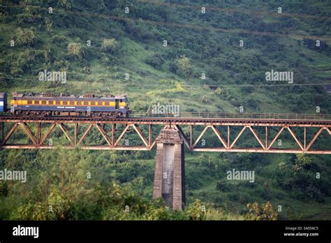 Indian Railways Train Passing By Heightened Up Bridge At Igatpuri Near