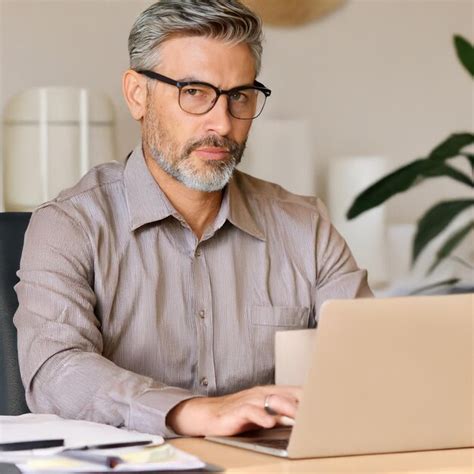 Busy Middle Aged Business Man Executive Wearing Shirt And Glasses