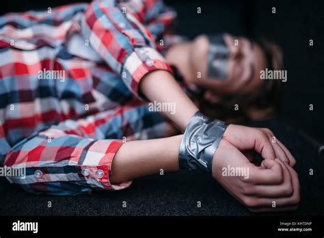 Female Victim Of A Maniac In Car Trunk Mouth And Hands Sealed With