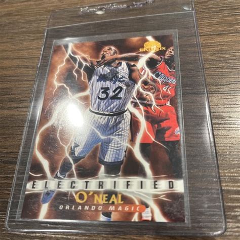 1996 97 Skybox Electrified Shaquille Oneal 293 Trading Card
