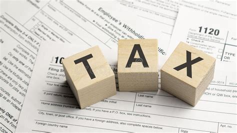 Word Tax Written On Wooden Cubes Tax Concept Editorial Stock Image