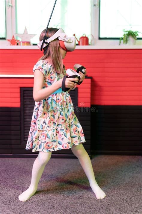 Vr Game And Virtual Reality Kid Girl Gamer Eight Years Old Fun Playing On Futuristic Simulation